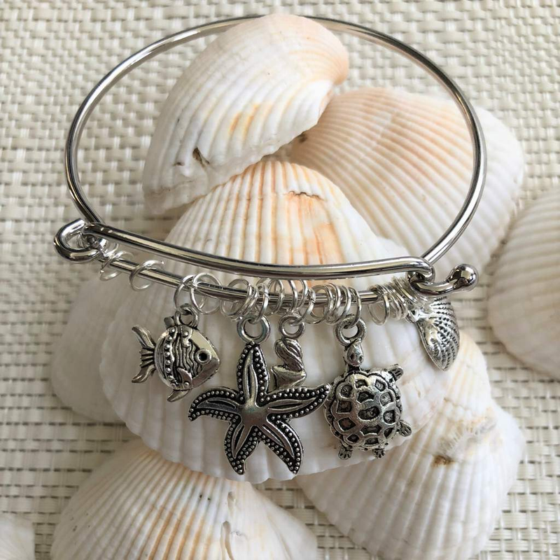 Buy the Beach Themed Silver Shell Bangle Bracelet | JaeBee Jewelry