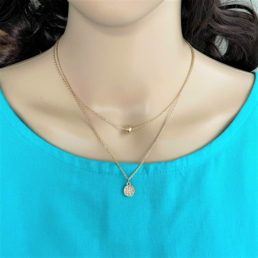 Buy the Gold Layered Ball and Crystal Charm Necklace | JaeBee Jewelry